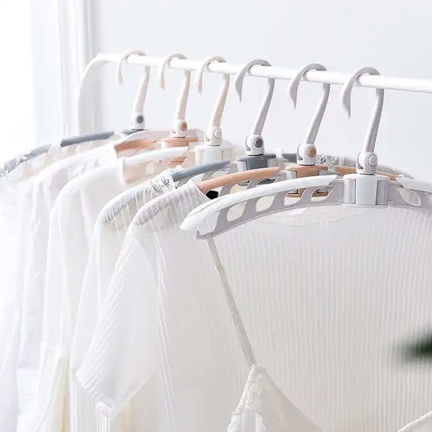 Buy Portable Folding Clothes Hanger - 360° Rotating | DeoDap