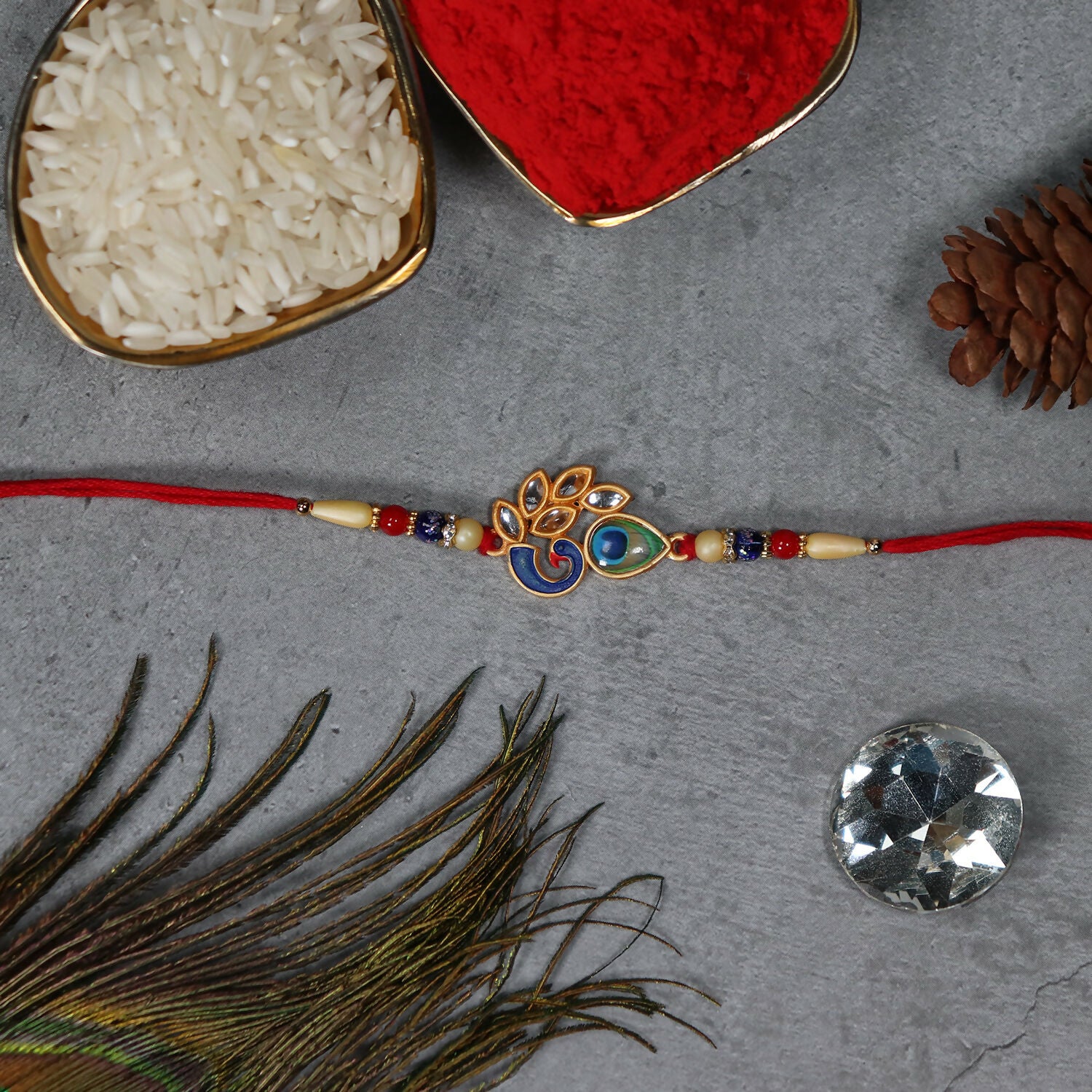Stylish Mor Pankh Rakhi with Stones & Blue Enamel